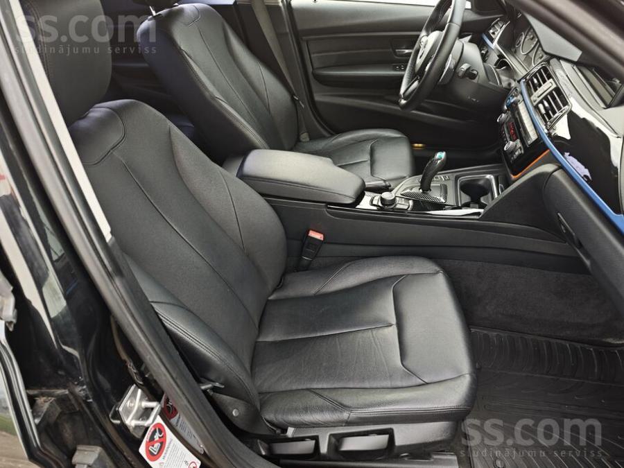 Black BMW 320 2013 in Riga, with an engine capacity of 2.00 L and mileage of 127 thousand km for 13950 €, photo 17 on AUTOMOTO.COM.LV