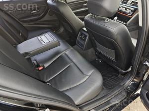 Black BMW 320 2013 in Riga, with an engine capacity of 2.00 L and mileage of 127 thousand km for 13950 €, photo 18 on AUTOMOTO.COM.LV