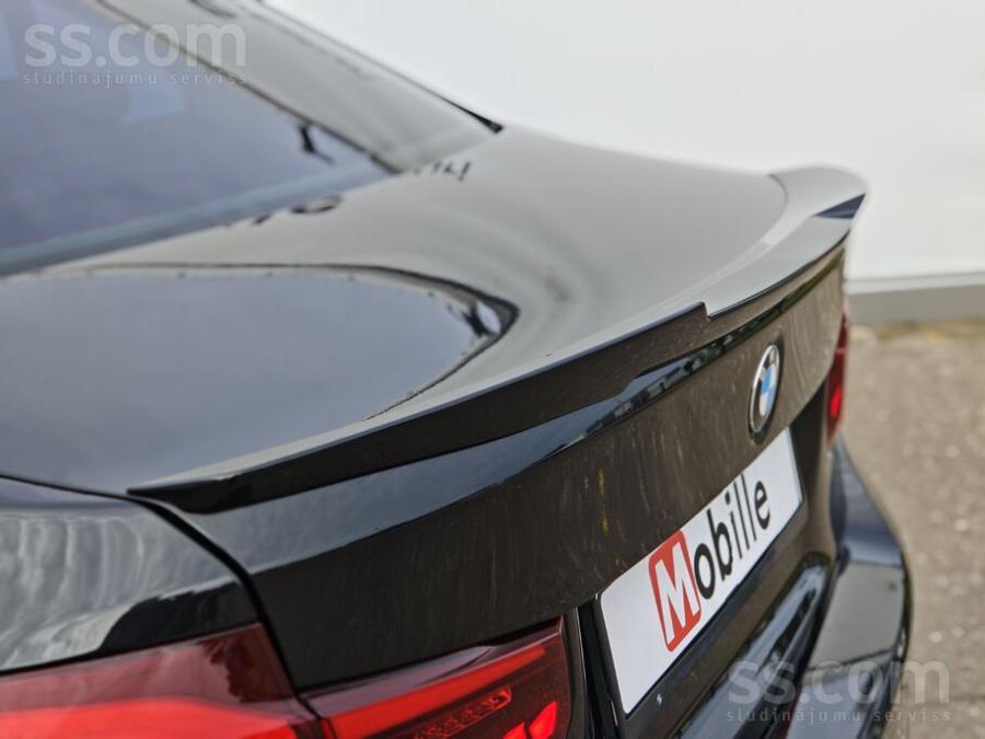 Black BMW 320 2013 in Riga, with an engine capacity of 2.00 L and mileage of 127 thousand km for 13950 €, photo 20 on AUTOMOTO.COM.LV