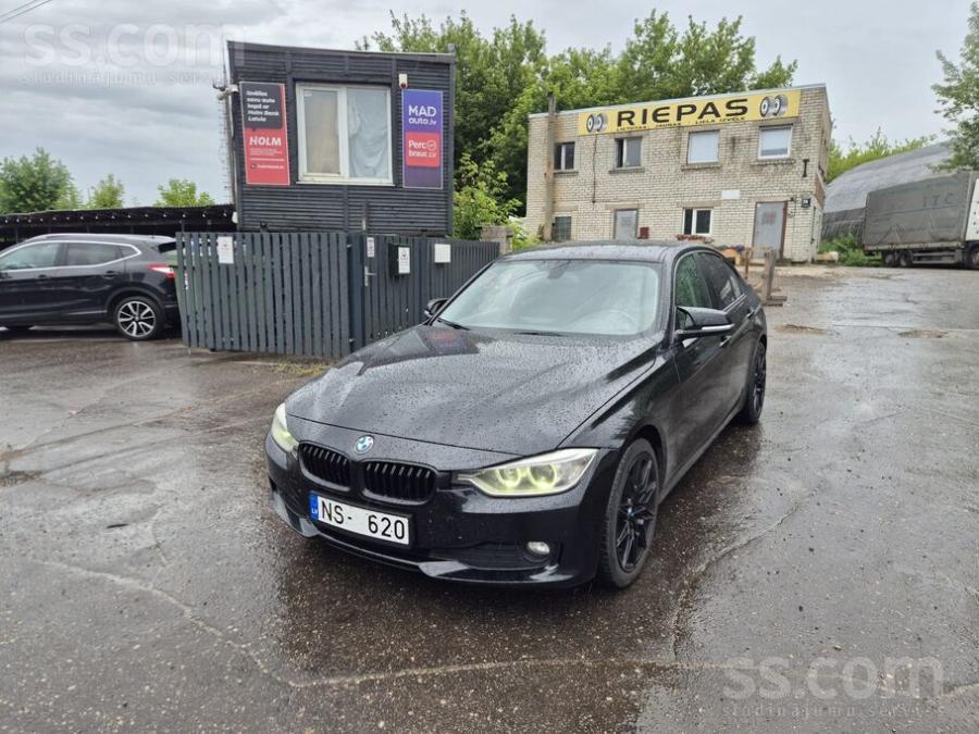 Black BMW 320 2014 in Riga, with an engine capacity of 2.00 L and mileage of 433 thousand km for 5890 €, photo 1 on AUTOMOTO.COM.LV