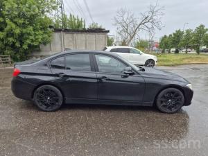 Black BMW 320 2014 in Riga, with an engine capacity of 2.00 L and mileage of 433 thousand km for 5890 €, photo 6 on AUTOMOTO.COM.LV