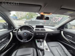 Black BMW 320 2014 in Riga, with an engine capacity of 2.00 L and mileage of 433 thousand km for 5890 €, photo 12 on AUTOMOTO.COM.LV