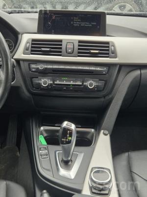 Black BMW 320 2014 in Riga, with an engine capacity of 2.00 L and mileage of 433 thousand km for 5890 €, photo 13 on AUTOMOTO.COM.LV