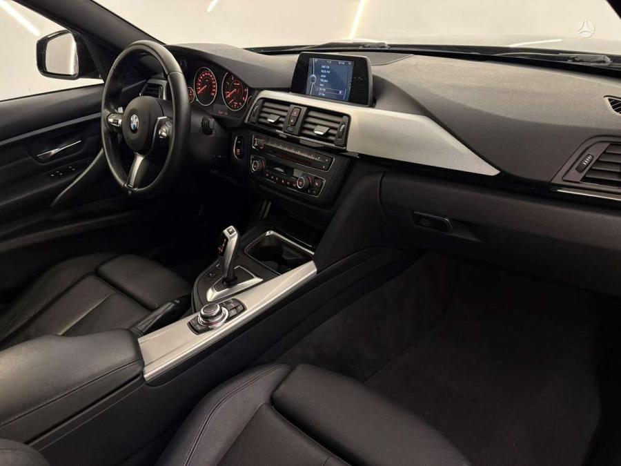 Black BMW 320 2014 in Marijampole, with an engine capacity of 2.00 L and mileage of 218 thousand km for 12500 €, photo 13 on AUTOMOTO.COM.LV