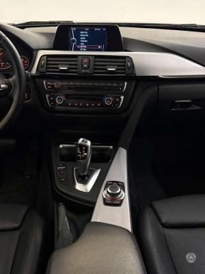 Black BMW 320 2014 in Marijampole, with an engine capacity of 2.00 L and mileage of 218 thousand km for 12500 €, photo 15 on AUTOMOTO.COM.LV