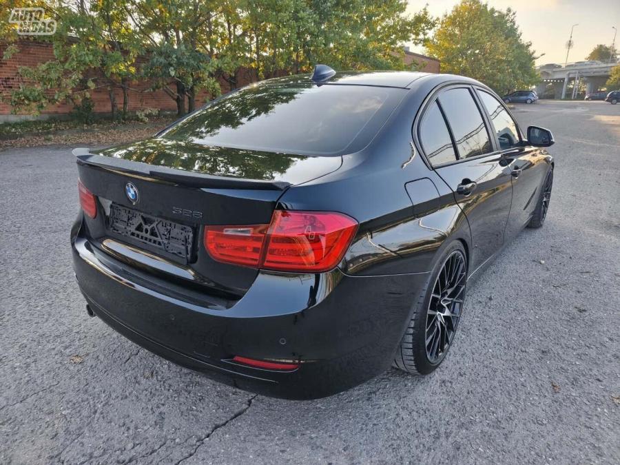 Black BMW 320 2014 in Siauliai, with an engine capacity of 2.00 L and mileage of 215 thousand km for 9300 €, photo 5 on AUTOMOTO.COM.LV