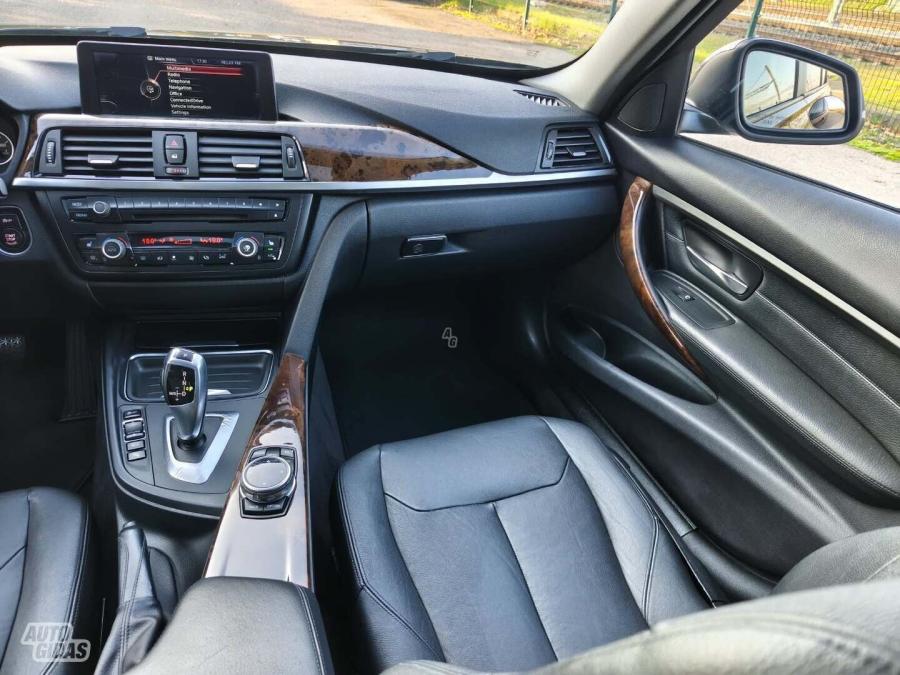 Black BMW 320 2014 in Siauliai, with an engine capacity of 2.00 L and mileage of 215 thousand km for 9300 €, photo 12 on AUTOMOTO.COM.LV