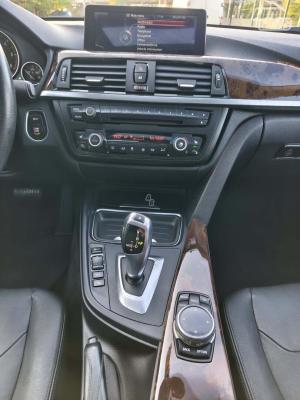 Black BMW 320 2014 in Siauliai, with an engine capacity of 2.00 L and mileage of 215 thousand km for 9300 €, photo 17 on AUTOMOTO.COM.LV