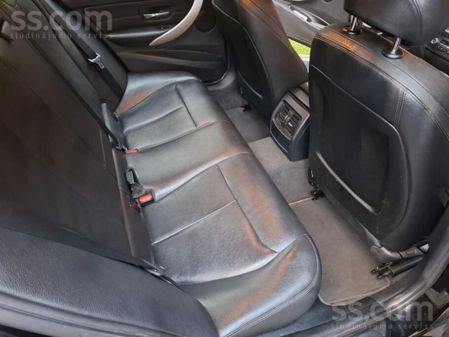 Black BMW 320 2015 in Riga, with an engine capacity of 2.00 L and mileage of 411 thousand km for 11250 €, photo 12 on AUTOMOTO.COM.LV