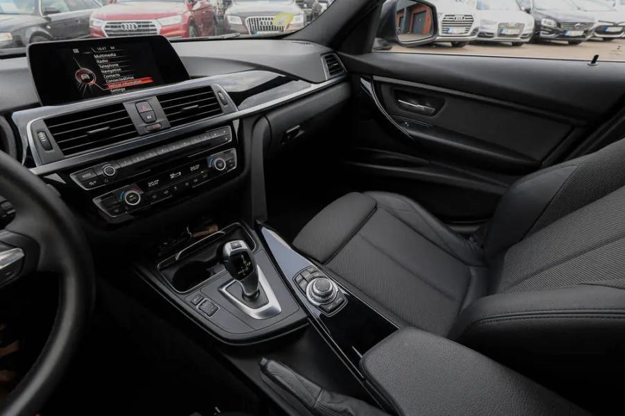 Black BMW 320 2015 in Jelgava, with an engine capacity of 2.00 L and mileage of 263 thousand km for 11750 €, photo 20 on AUTOMOTO.COM.LV
