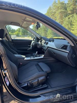 Black BMW 320 2015 in Riga, with an engine capacity of 2.00 L and mileage of 200 thousand km for 12000 €, photo 8 on AUTOMOTO.COM.LV