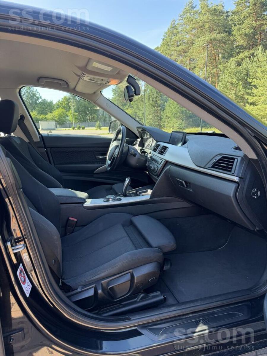 Black BMW 320 2015 in Riga, with an engine capacity of 2.00 L and mileage of 200 thousand km for 12000 €, photo 8 on AUTOMOTO.COM.LV