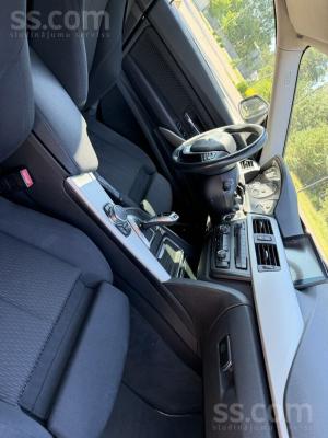 Black BMW 320 2015 in Riga, with an engine capacity of 2.00 L and mileage of 200 thousand km for 12000 €, photo 9 on AUTOMOTO.COM.LV