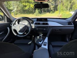 Black BMW 320 2015 in Riga, with an engine capacity of 2.00 L and mileage of 200 thousand km for 12000 €, photo 12 on AUTOMOTO.COM.LV