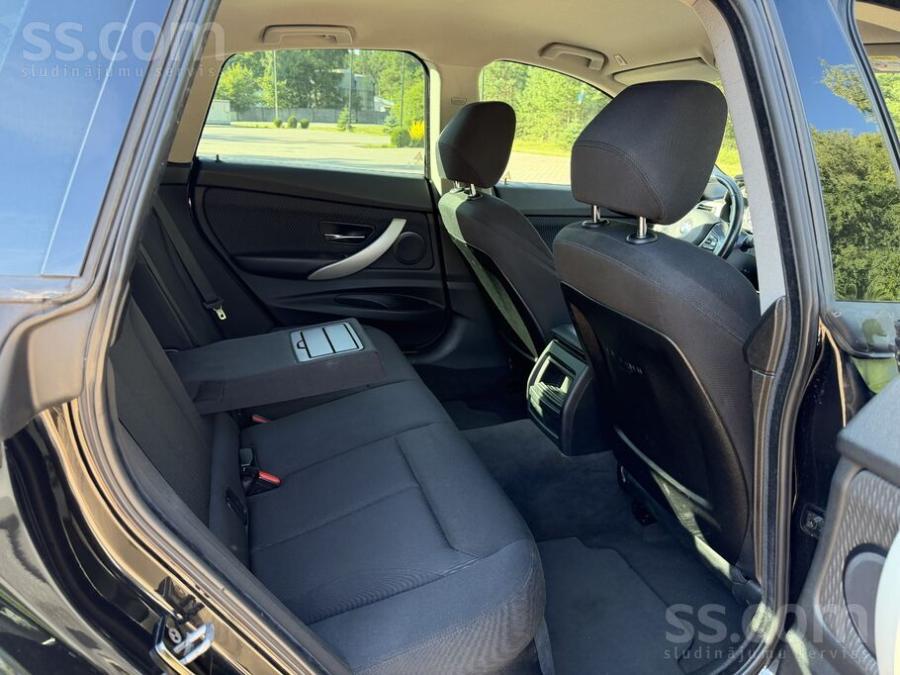 Black BMW 320 2015 in Riga, with an engine capacity of 2.00 L and mileage of 200 thousand km for 12000 €, photo 13 on AUTOMOTO.COM.LV