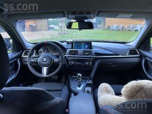Black BMW 320 2015 in Riga, with an engine capacity of 2.00 L and mileage of 200 thousand km for 17500 €, photo 8 on AUTOMOTO.COM.LV