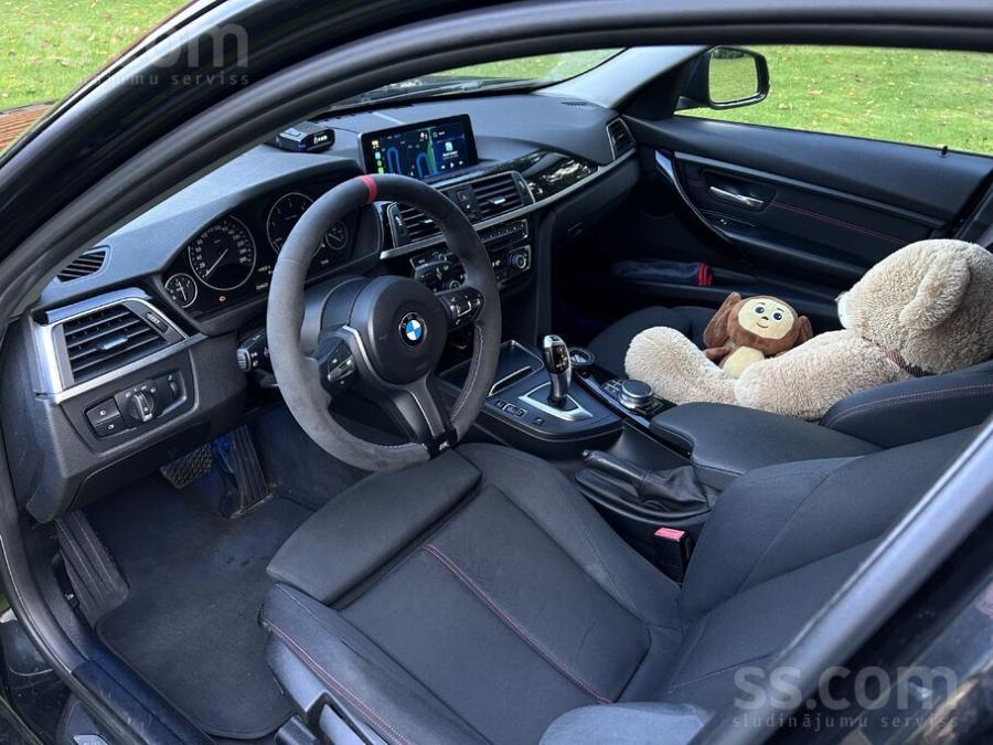 Black BMW 320 2015 in Riga, with an engine capacity of 2.00 L and mileage of 200 thousand km for 17500 €, photo 9 on AUTOMOTO.COM.LV