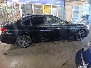 Black BMW 320 2016 in Avizieniai, with an engine capacity of 2.00 L and mileage of 215 thousand km for 11300 €, photo 7 on AUTOMOTO.COM.LV