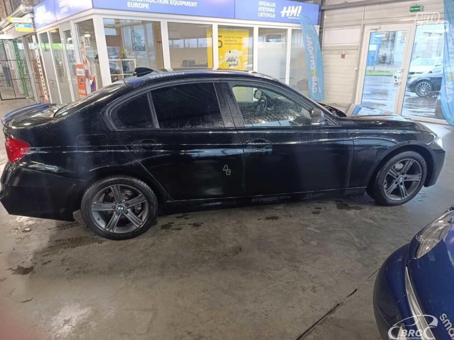 Black BMW 320 2016 in Avizieniai, with an engine capacity of 2.00 L and mileage of 215 thousand km for 11300 €, photo 7 on AUTOMOTO.COM.LV