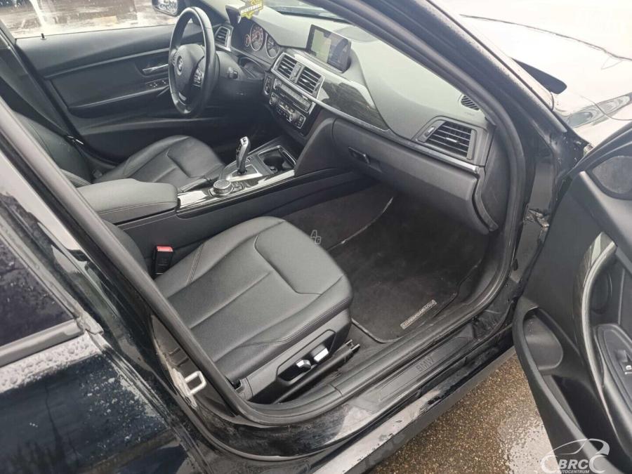 Black BMW 320 2016 in Avizieniai, with an engine capacity of 2.00 L and mileage of 215 thousand km for 11300 €, photo 12 on AUTOMOTO.COM.LV