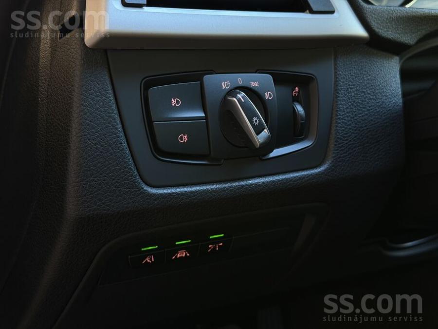 Black BMW 320 2016 in Jelgava, with an engine capacity of 2.00 L and mileage of 197 thousand km for 16990 €, photo 21 on AUTOMOTO.COM.LV