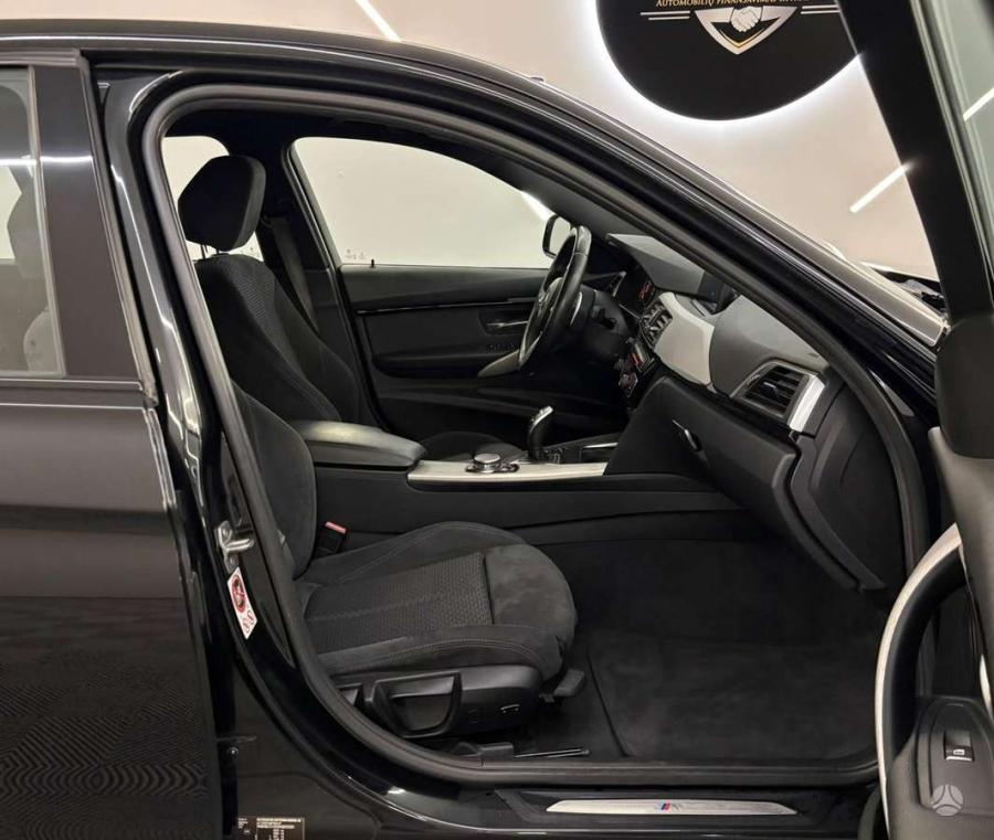 Black BMW 320 2016 in Marijampole, with an engine capacity of 2.00 L and mileage of 301 thousand km for 12499 €, photo 12 on AUTOMOTO.COM.LV