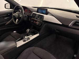 Black BMW 320 2016 in Marijampole, with an engine capacity of 2.00 L and mileage of 301 thousand km for 12499 €, photo 13 on AUTOMOTO.COM.LV