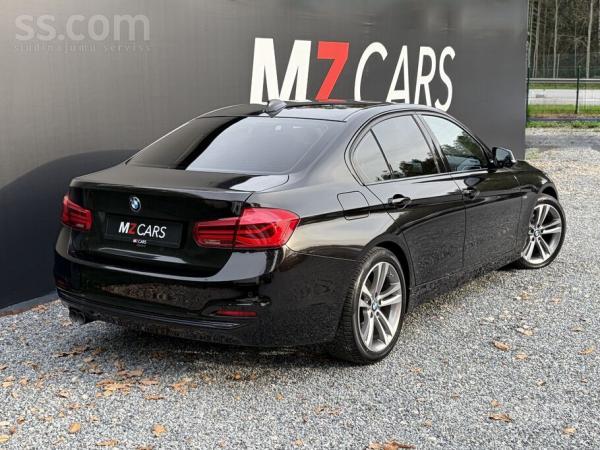 Black BMW 320 2016 in Riga, with an engine capacity of 2.00 L and mileage of 185 thousand km for 13990 €, photo 6 on AUTOMOTO.COM.LV