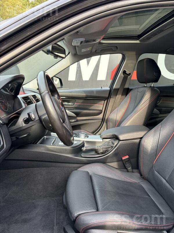 Black BMW 320 2016 in Riga, with an engine capacity of 2.00 L and mileage of 185 thousand km for 13990 €, photo 8 on AUTOMOTO.COM.LV