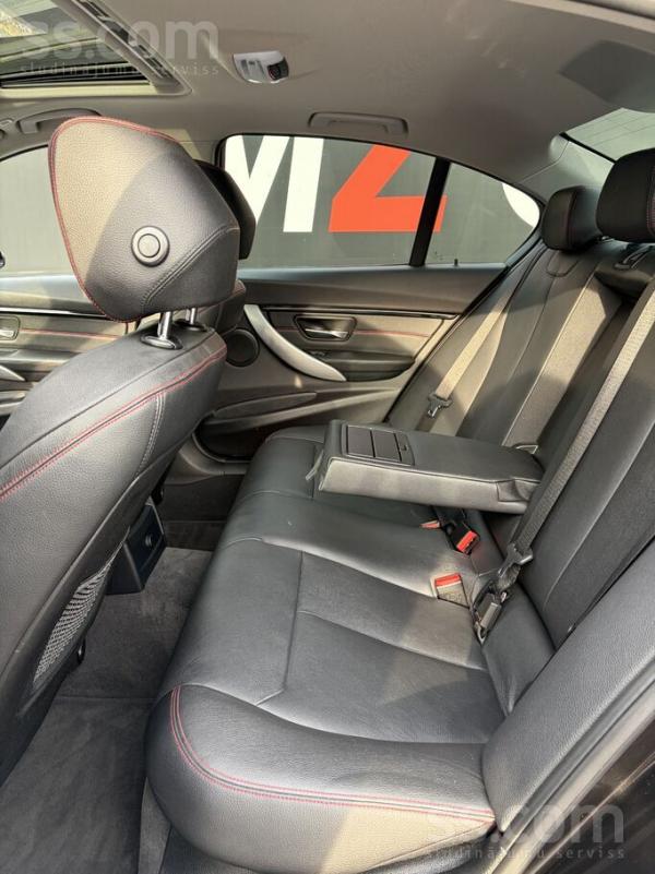 Black BMW 320 2016 in Riga, with an engine capacity of 2.00 L and mileage of 185 thousand km for 13990 €, photo 9 on AUTOMOTO.COM.LV