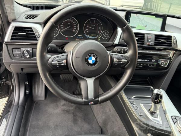 Black BMW 320 2016 in Riga, with an engine capacity of 2.00 L and mileage of 185 thousand km for 13990 €, photo 11 on AUTOMOTO.COM.LV