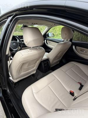 Black BMW 320 2017 in Riga, with an engine capacity of 2.00 L and mileage of 158 thousand km for 15500 €, photo 9 on AUTOMOTO.COM.LV