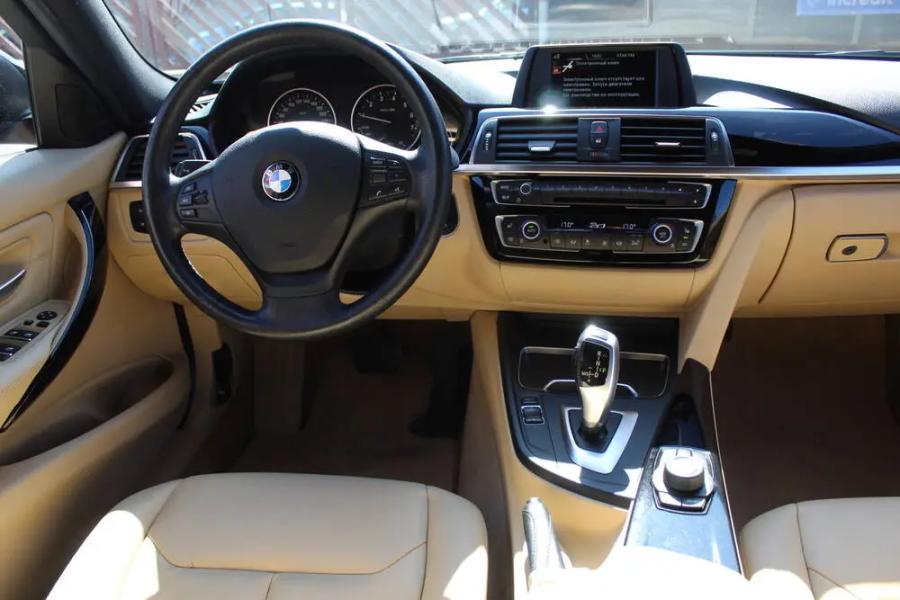 Black BMW 320 2017 in Liepaja, with an engine capacity of 2.00 L and mileage of 122 thousand km for 16750 €, photo 11 on AUTOMOTO.COM.LV