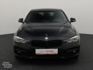 Black BMW 320 2018 in Vilnius, with an engine capacity of 2.00 L and mileage of 235 thousand km for 15499 €, photo 3 on AUTOMOTO.COM.LV