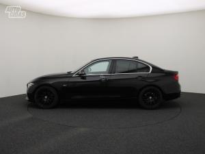 Black BMW 320 2018 in Vilnius, with an engine capacity of 2.00 L and mileage of 235 thousand km for 15499 €, photo 6 on AUTOMOTO.COM.LV