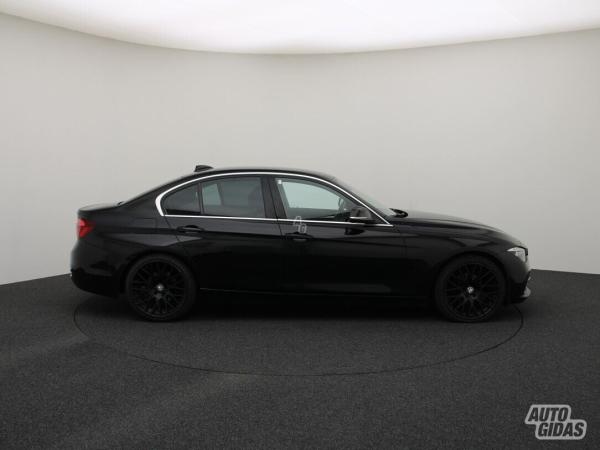 Black BMW 320 2018 in Vilnius, with an engine capacity of 2.00 L and mileage of 235 thousand km for 15499 €, photo 9 on AUTOMOTO.COM.LV