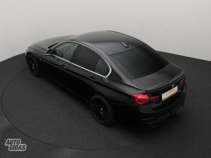Black BMW 320 2018 in Vilnius, with an engine capacity of 2.00 L and mileage of 235 thousand km for 15499 €, photo 12 on AUTOMOTO.COM.LV