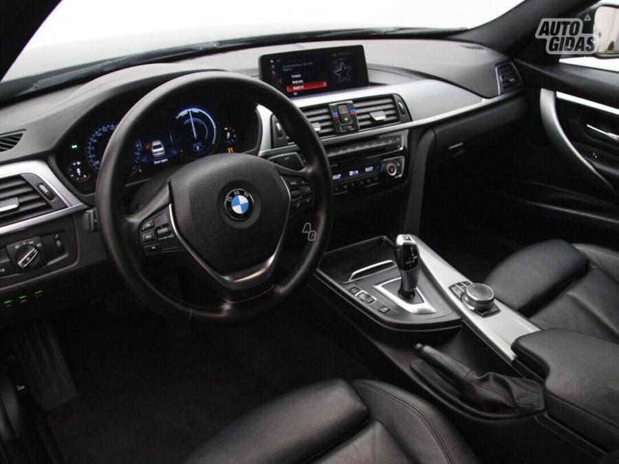 Black BMW 320 2018 in Vilnius, with an engine capacity of 2.00 L and mileage of 235 thousand km for 15499 €, photo 16 on AUTOMOTO.COM.LV