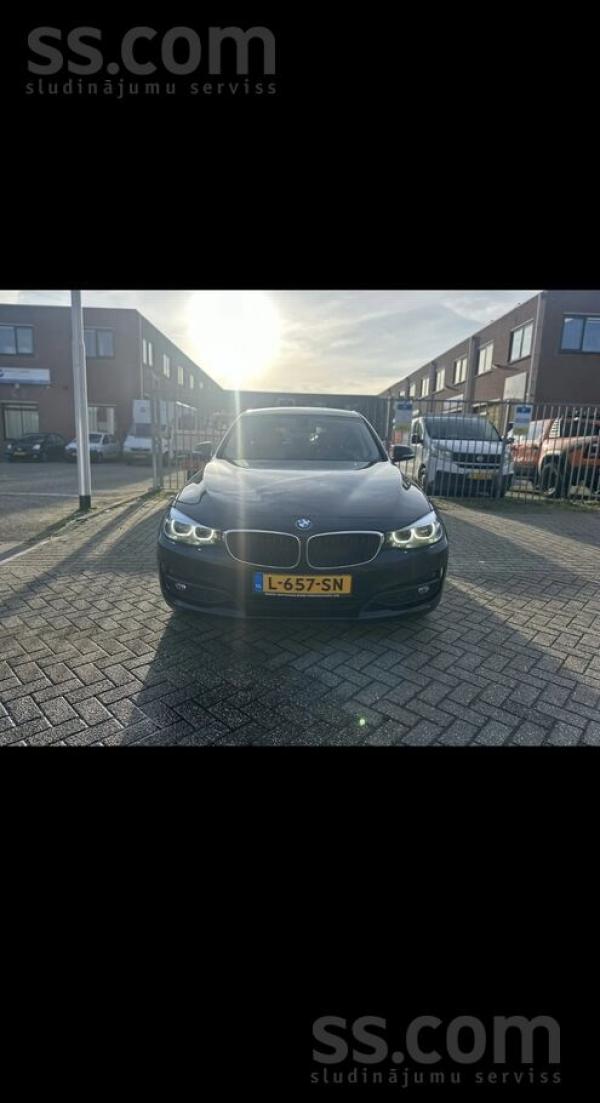 Black BMW 320 2019 in Riga, with an engine capacity of 2.00 L and mileage of 214 thousand km for 16200 €, photo 4 on AUTOMOTO.COM.LV