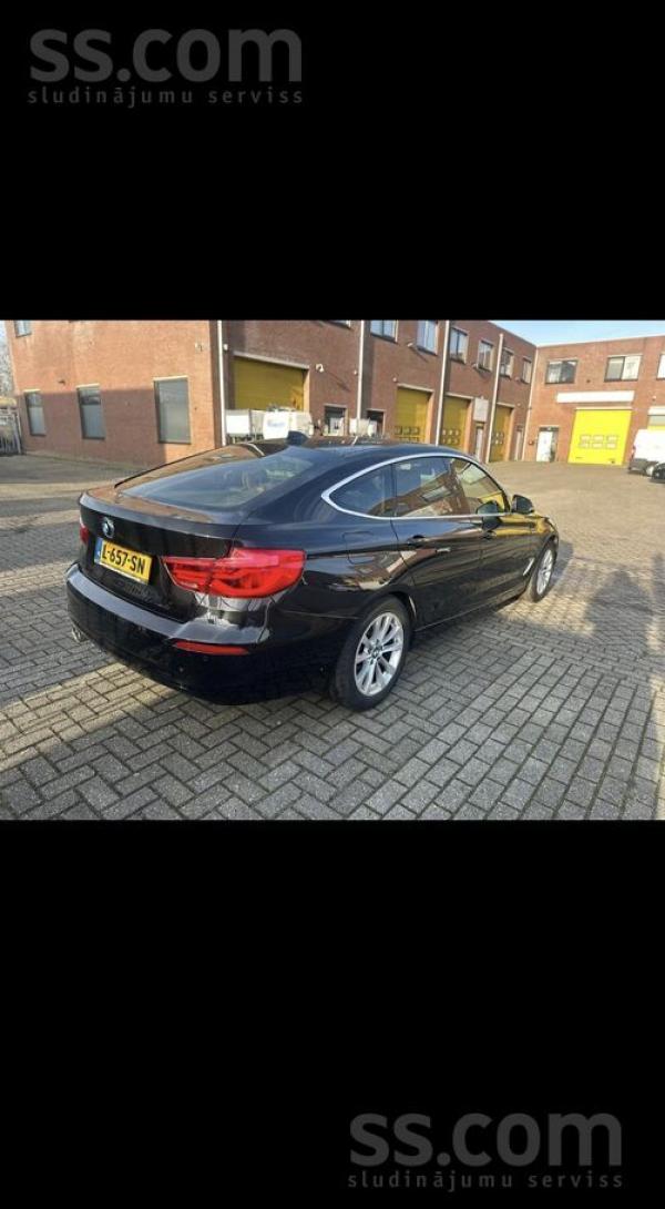 Black BMW 320 2019 in Riga, with an engine capacity of 2.00 L and mileage of 214 thousand km for 16200 €, photo 7 on AUTOMOTO.COM.LV