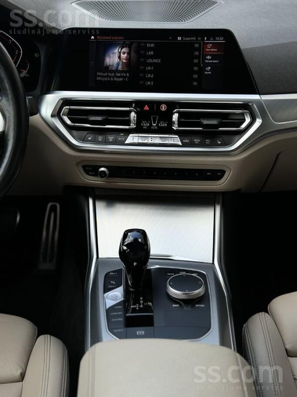 Black BMW 320 2019 in Riga, with an engine capacity of 2.00 L and mileage of 127 thousand km for 26400 €, photo 8 on AUTOMOTO.COM.LV