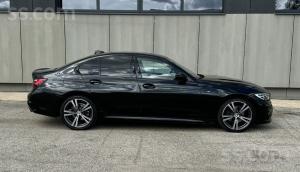 Black BMW 320 2019 in Riga, with an engine capacity of 2.00 L and mileage of 128 thousand km for 26400 €, photo 6 on AUTOMOTO.COM.LV