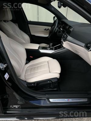 Black BMW 320 2019 in Riga, with an engine capacity of 2.00 L and mileage of 128 thousand km for 26400 €, photo 7 on AUTOMOTO.COM.LV