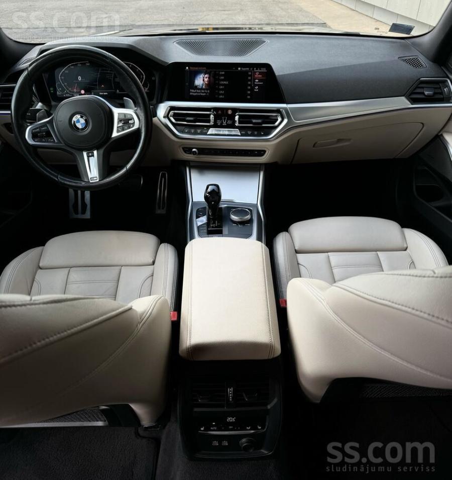 Black BMW 320 2019 in Riga, with an engine capacity of 2.00 L and mileage of 128 thousand km for 26400 €, photo 8 on AUTOMOTO.COM.LV