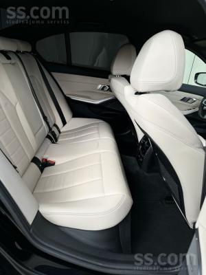 Black BMW 320 2019 in Riga, with an engine capacity of 2.00 L and mileage of 128 thousand km for 26400 €, photo 13 on AUTOMOTO.COM.LV