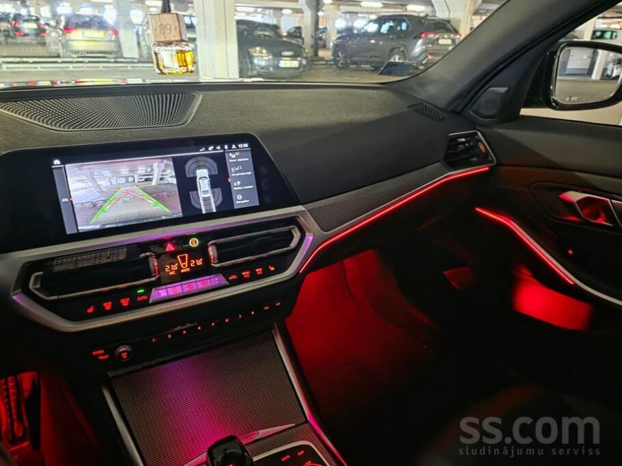 Black BMW 320 2019 in Riga, with an engine capacity of 2.00 L and mileage of 68 thousand km for 28500 €, photo 6 on AUTOMOTO.COM.LV