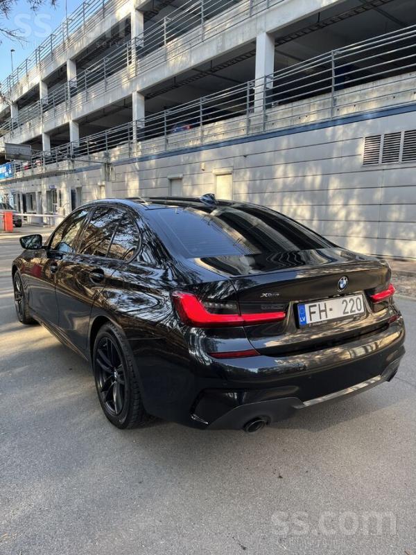 Black BMW 320 2020 in Riga, with an engine capacity of 2.00 L and mileage of 107 thousand km for 25995 €, photo 4 on AUTOMOTO.COM.LV
