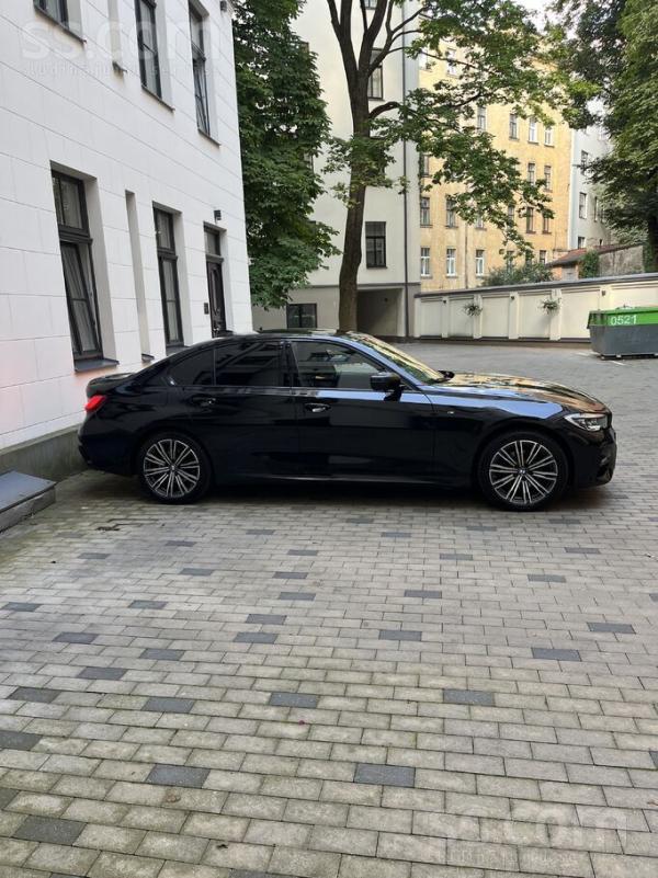 Black BMW 320 2020 in Riga, with an engine capacity of 2.00 L and mileage of 107 thousand km for 25995 €, photo 8 on AUTOMOTO.COM.LV