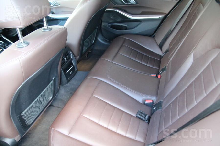 Black BMW 320 2021 in Riga, with an engine capacity of 2.00 L and mileage of 87 thousand km for 28200 €, photo 7 on AUTOMOTO.COM.LV