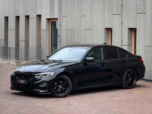 Black BMW 320 2021 in Riga, with an engine capacity of 2.00 L and mileage of 167 thousand km for 20500 €, photo 4 on AUTOMOTO.COM.LV